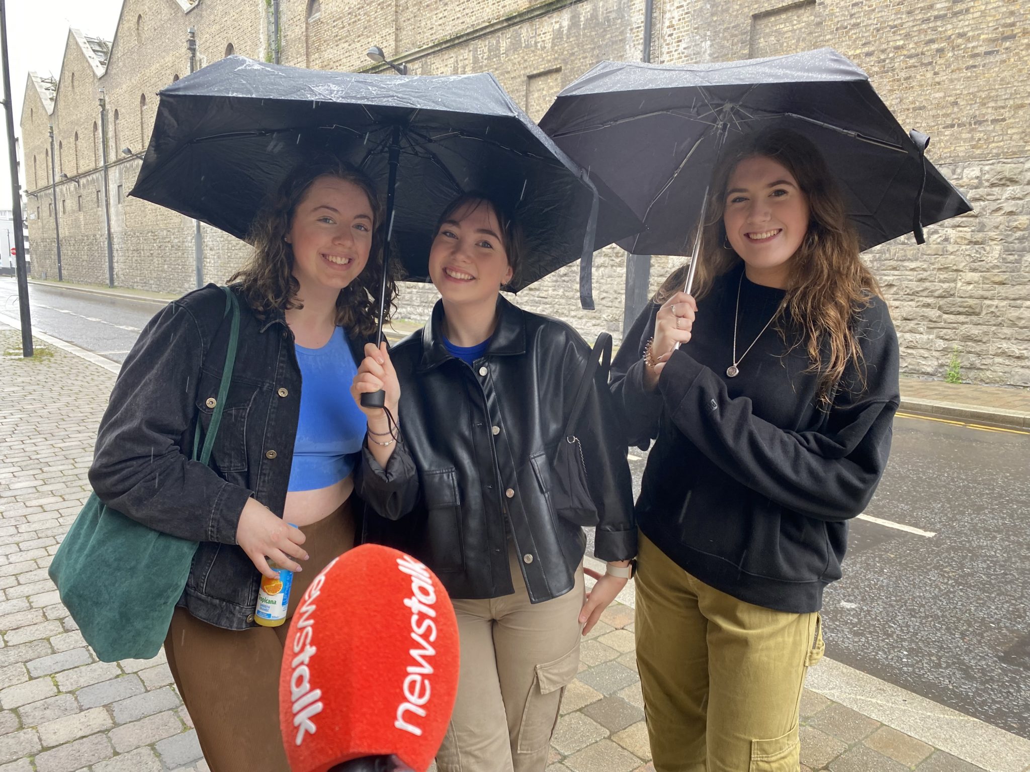 "We don't mind the bad weather." Tourists expect Irish rain | Newstalk
