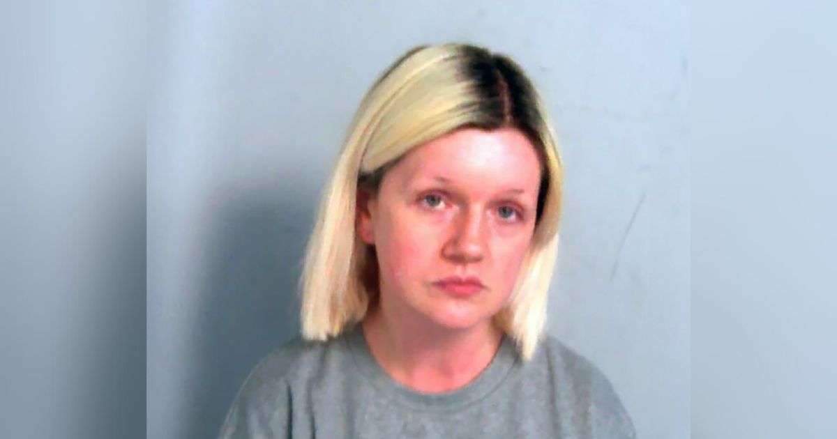 Woman who murdered parents and lived with their bodies is jailed for ...